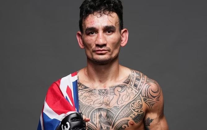 What does Max Holloway's tattoo say?