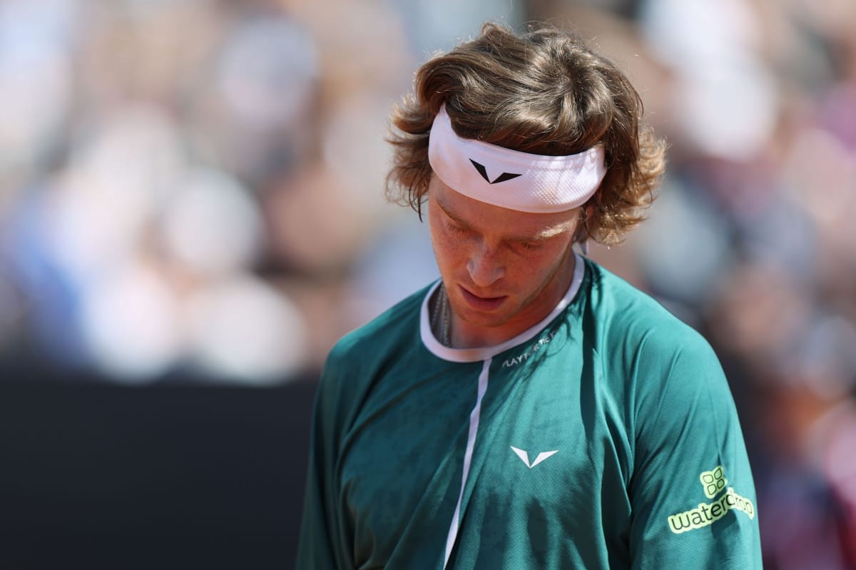 WATCH: Andrey Rublev smashes his knees, kicks players' bench in anger ...