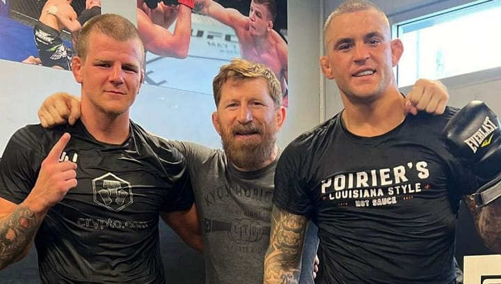 Who is Dustin Poirier's Head Coach?
