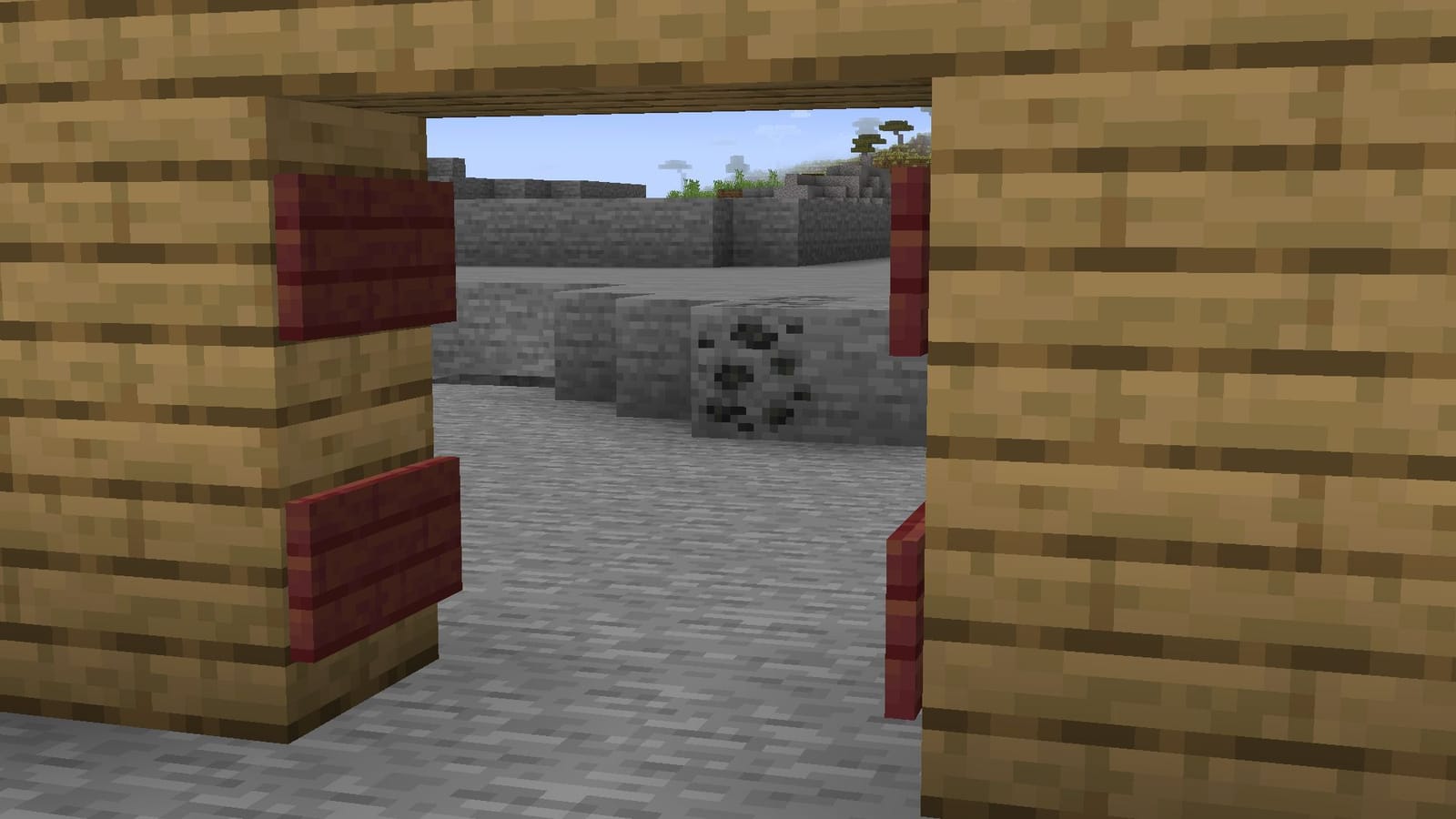 How to make a secret door using paintings in Minecraft