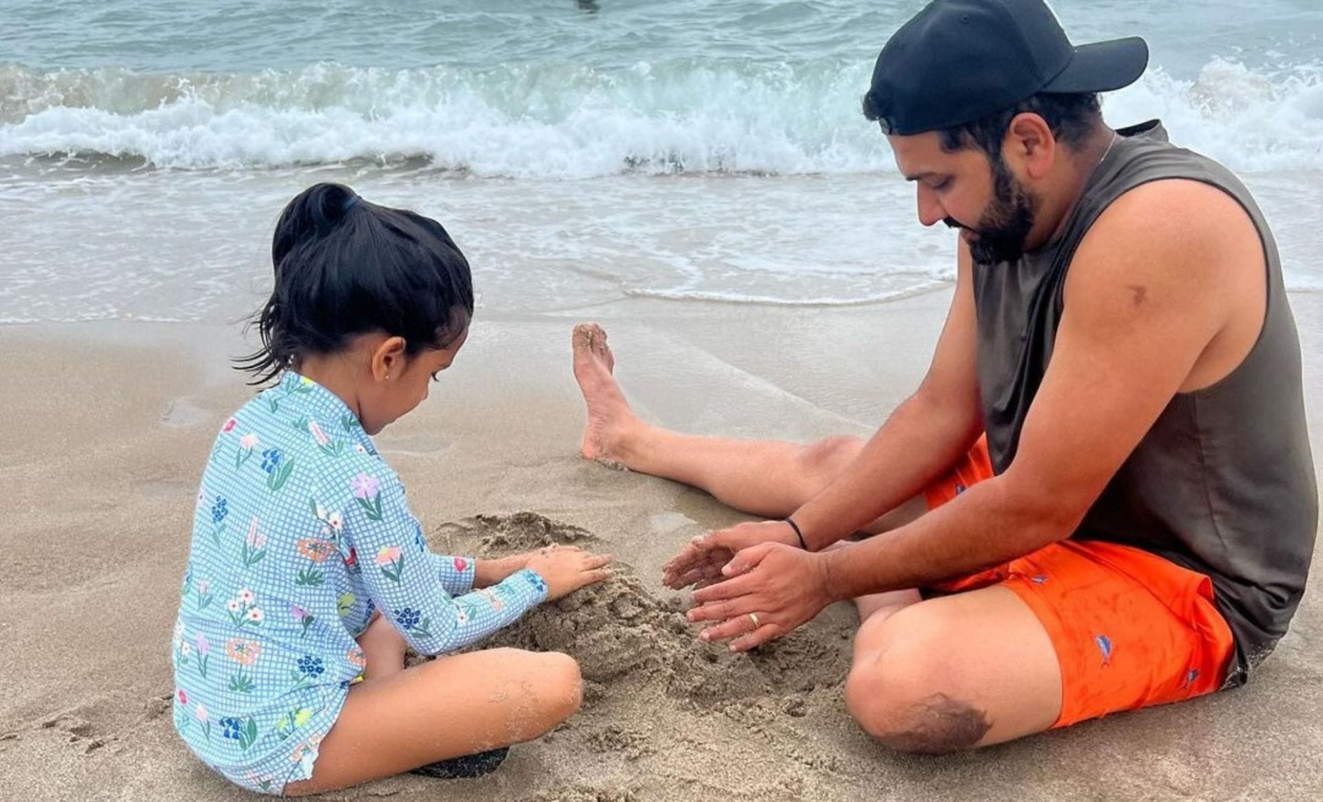 [In Pictures] Rohit Sharma enjoys beach day with daughter Samaira ...