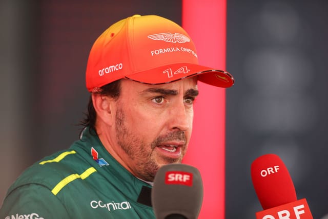 Watch: Fernando Alonso throws away his jacket and cap in anger after ...
