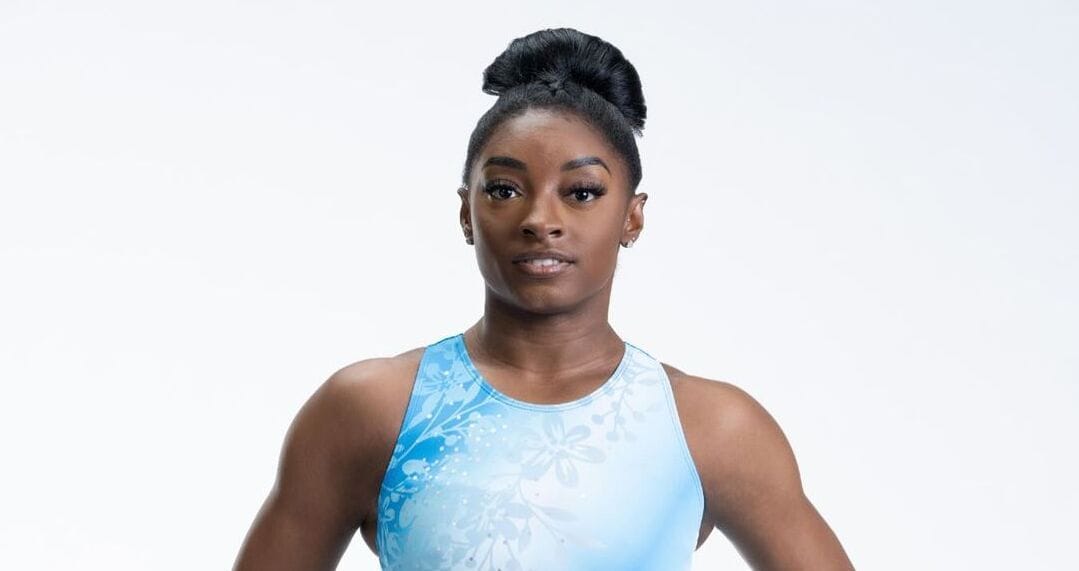 Was Simone Biles in foster care as a child?