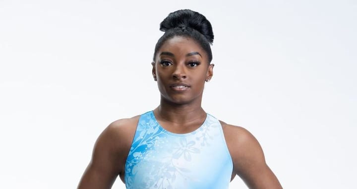 Was Simone Biles in foster care as a child?