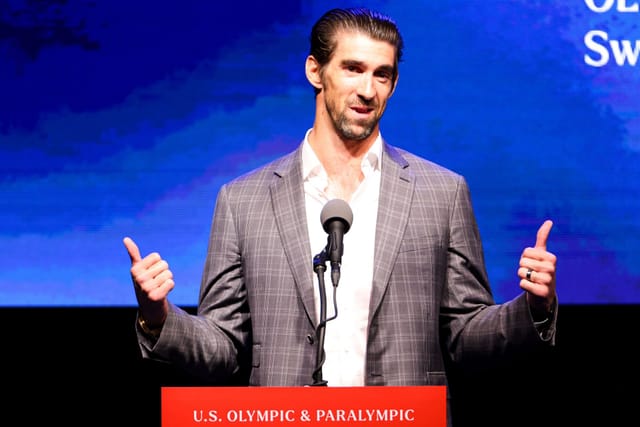 Michael Phelps reacts to Team USA's 4x100m freestyle relay team winning ...