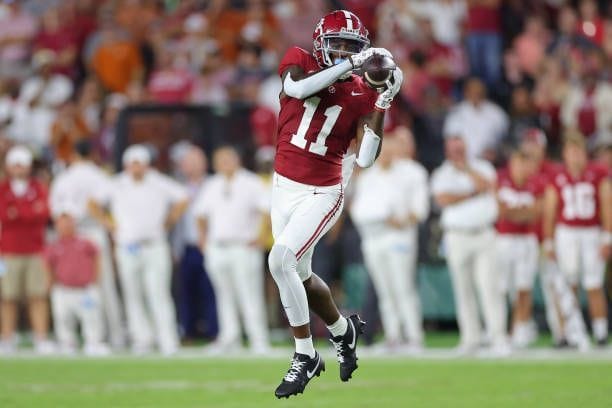 Where did Malik Benson go to College?