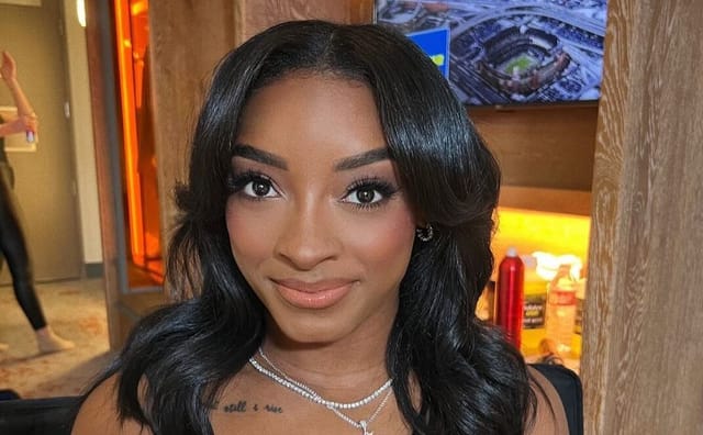 Was Simone Biles in foster care as a child?