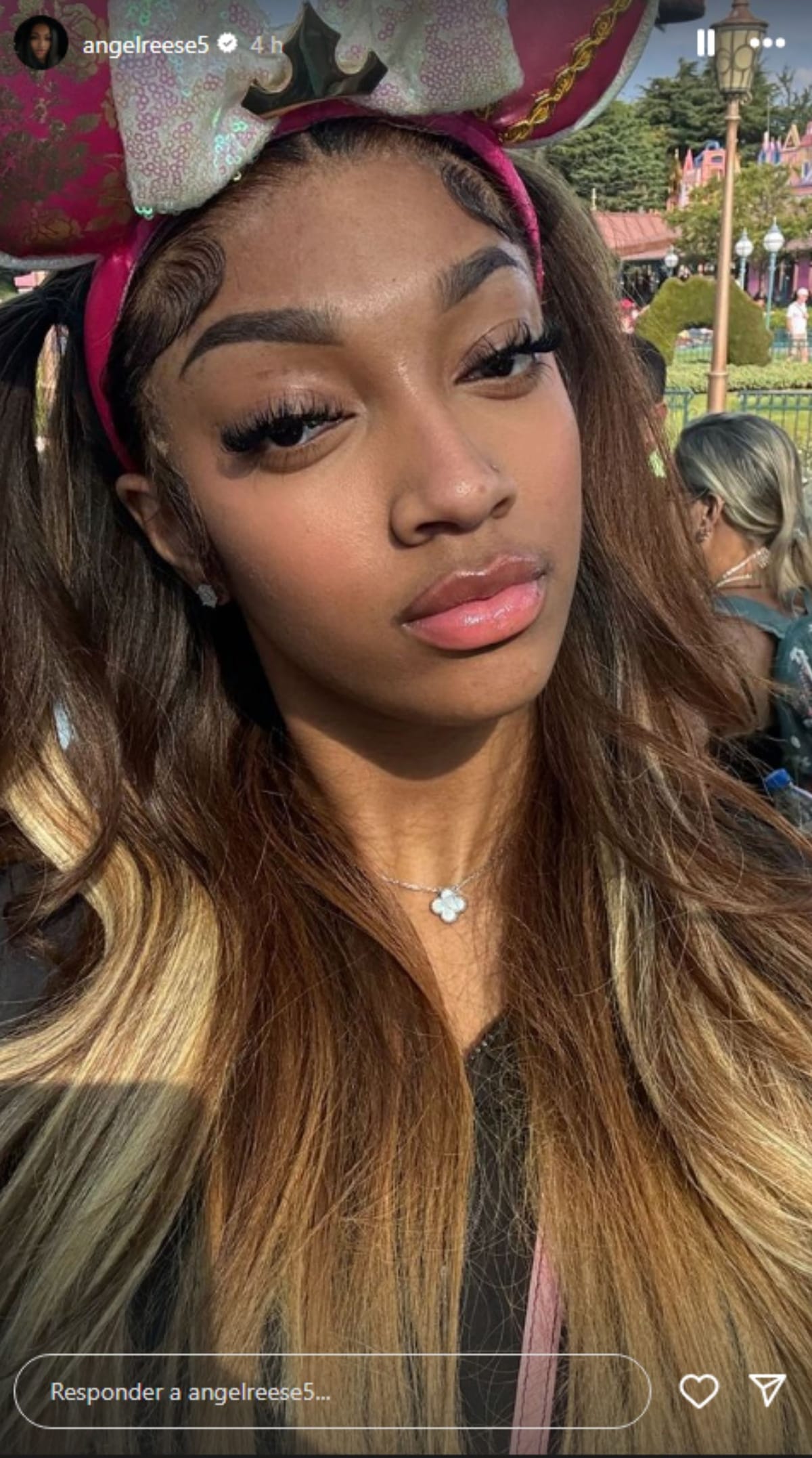 In Photos: Angel Reese rocks Mickey ears with $2,396 LV bag and $1,600 ...