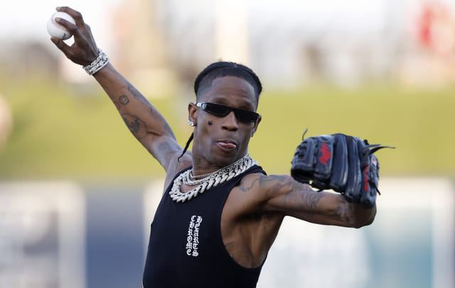 In Photos: Rapper Travis Scott shows off his WWE Astros belt while ...