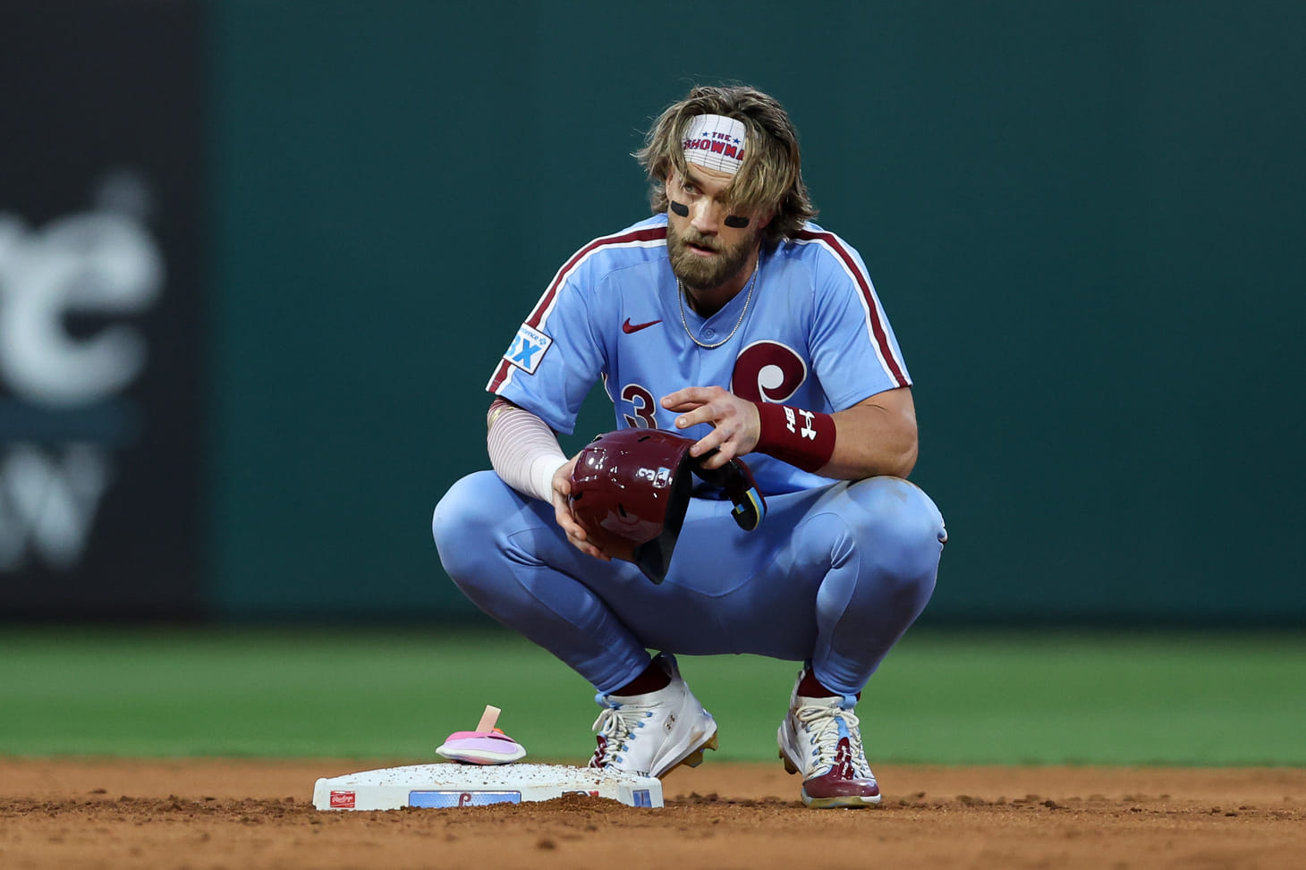 WATCH: Bryce Harper sends Braves infielder's hat flying during tense on ...
