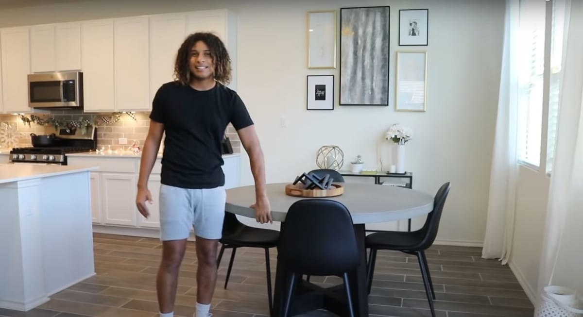 Where does Dominic Toliver live?