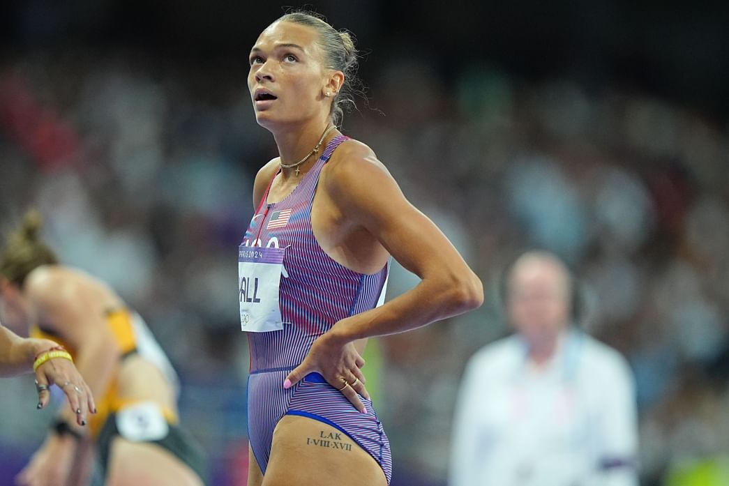 "Kind of getting torn back and forth between two" - Anna Hall weighs in ...