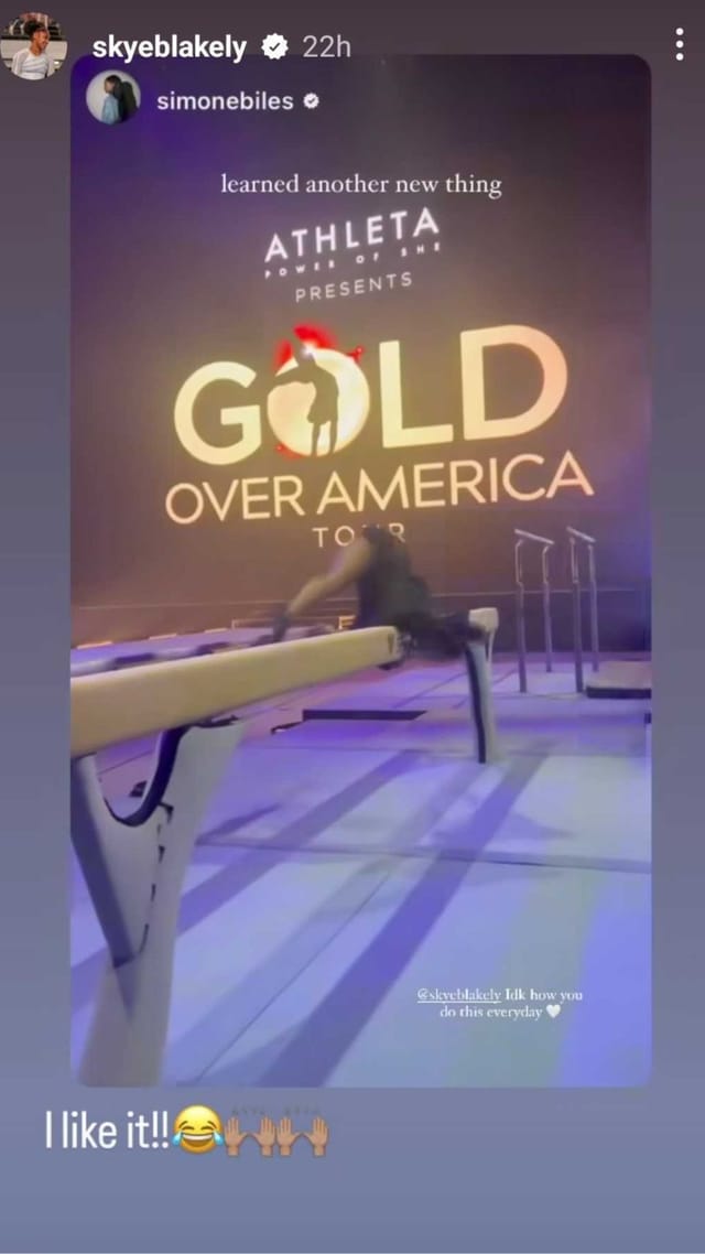 Skye Blakely reacts to Simone Biles trying out her signature mount on the balance beam for Gold ...