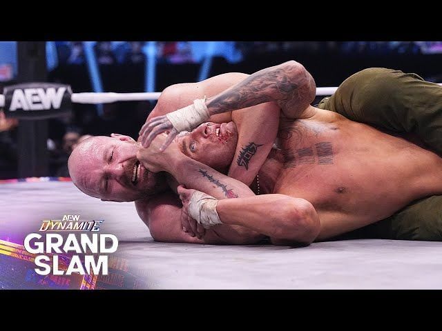 Claudio Castagnoli reacts to Bryan Danielson choking Jon Moxley with a five-word message