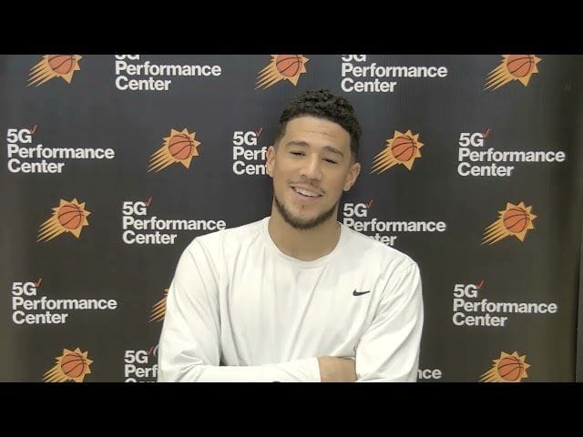Watch: Phoenix Suns star Devin Booker shows off arm strength, throws 50 ...