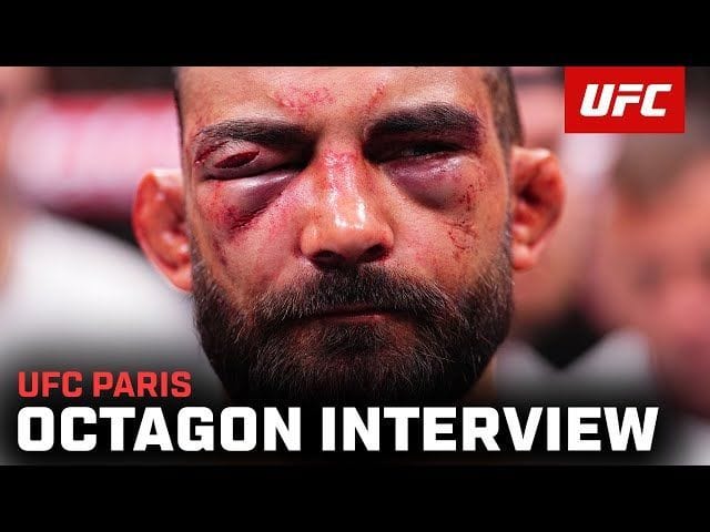 Close-up photo of Benoit Saint Denis' face getting busted open by ...