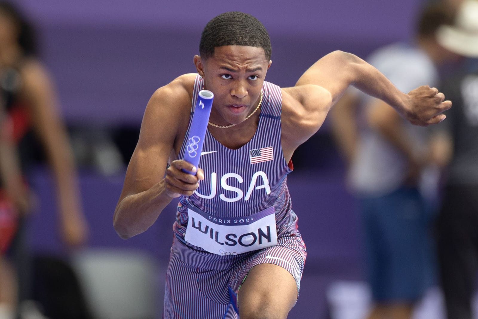 16-year-old Olympic Gold medalist Quincy Wilson receives the honor to ...