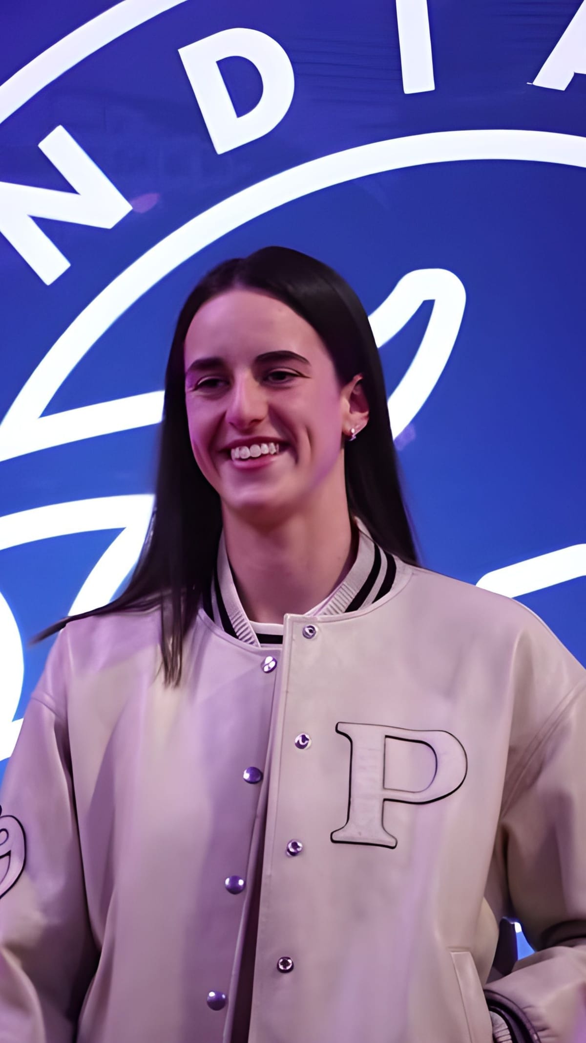 Photos: Caitlin Clark sports $7,312 Prada bomber jacket with short skirt ahead of Fever vs Dream ...