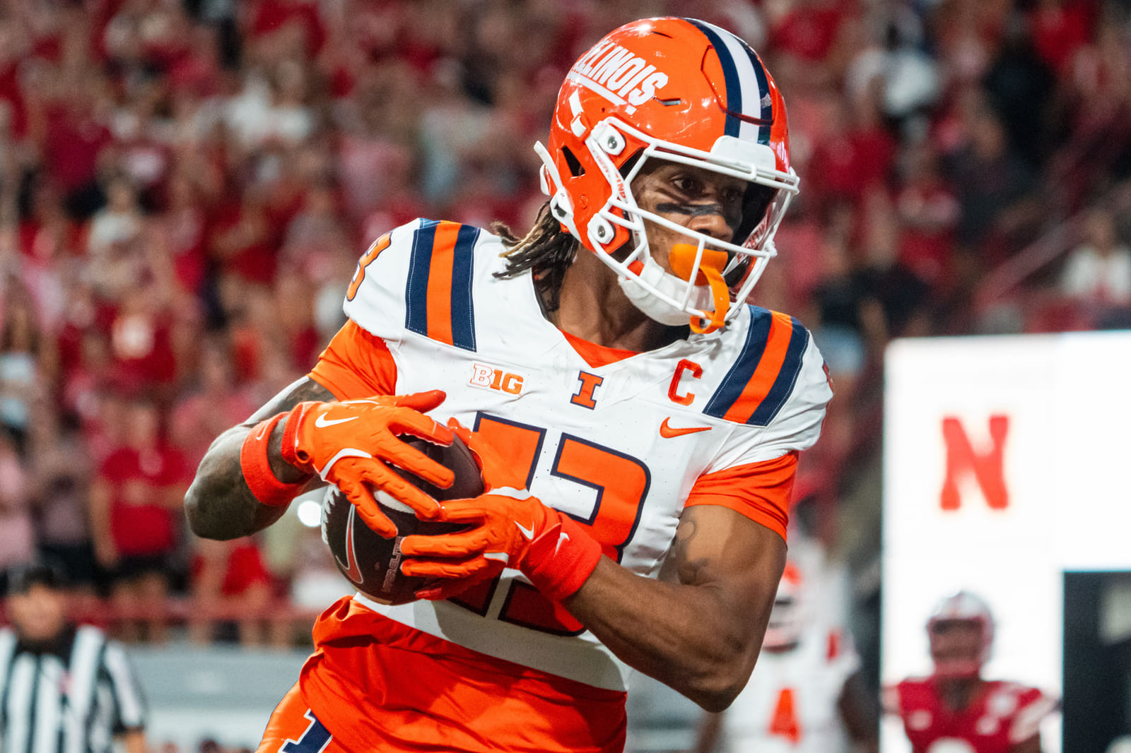 IN PICS: Illinois WR Pat Bryant and fiancée Tori glam up in white for a ...