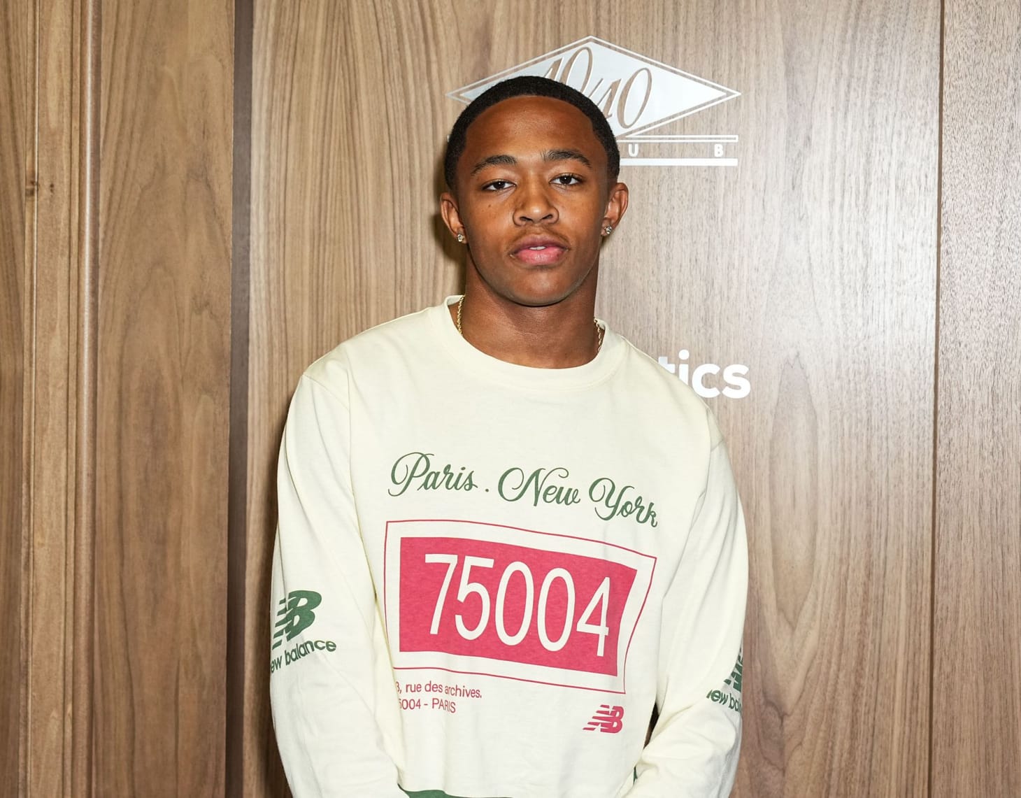 In Pictures: Quincy Wilson poses with the 2024 NCAA indoor trophy while ...