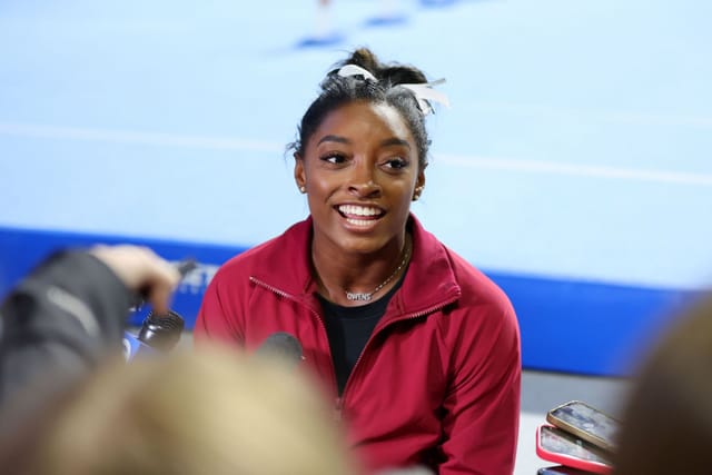 Simone Biles shows off new braided hairstyle as she poses in a stunning ...