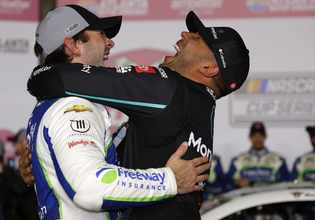 Daniel Suarez drops 2-word response as he holds close friend Bubba ...