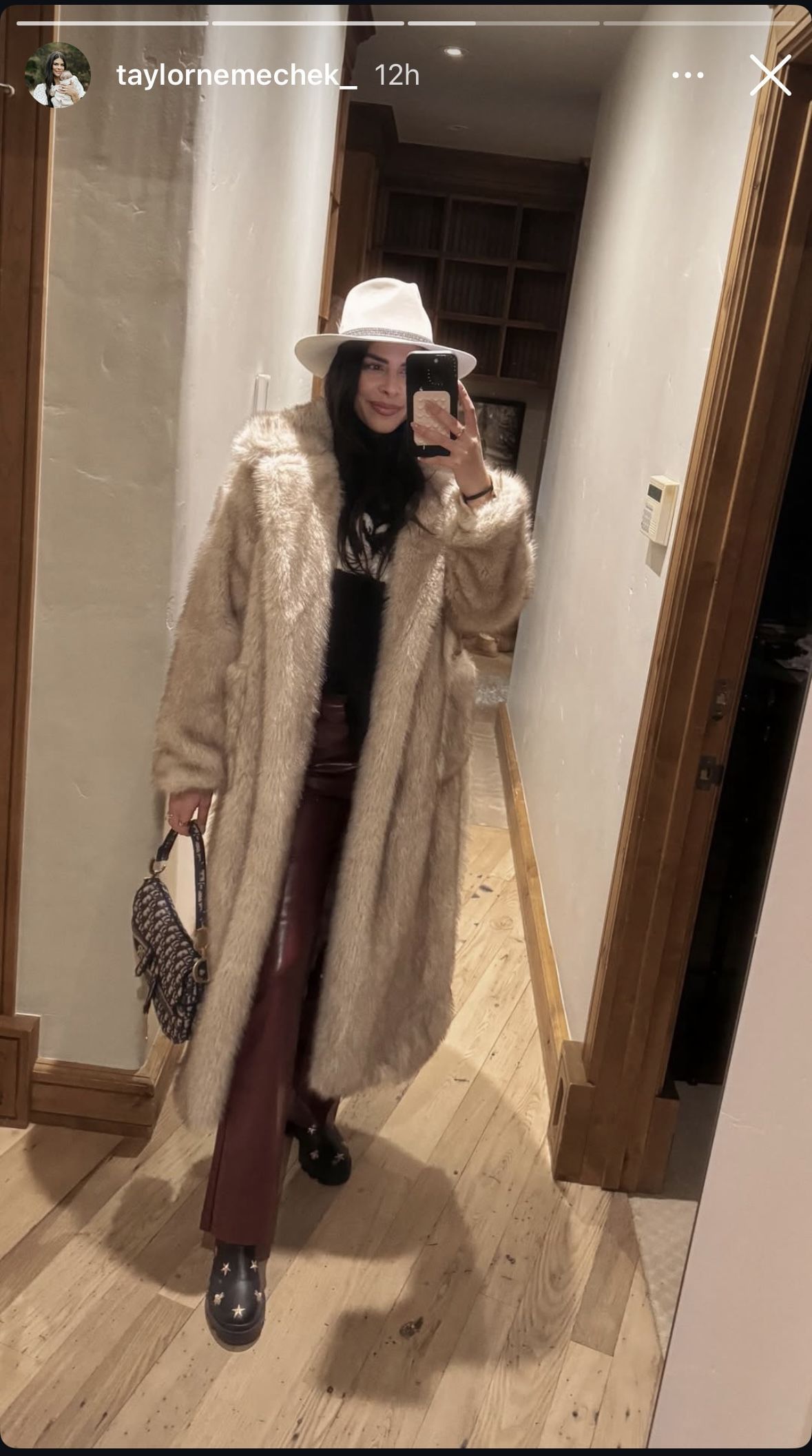 John Hunter Nemechek’s wife Taylor makes a fashion statement in long fur coat and burgundy ...