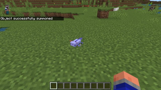How to spawn a blue axolotl in Minecraft Bedrock Edition