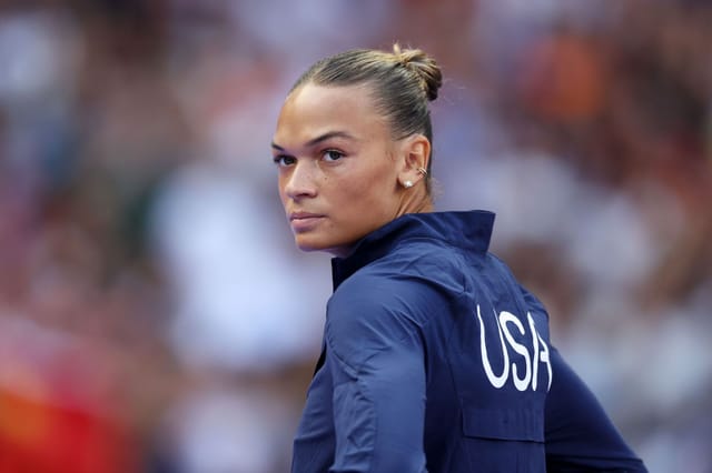 Anna Hall shares a two-word description for her coach as she extends ...