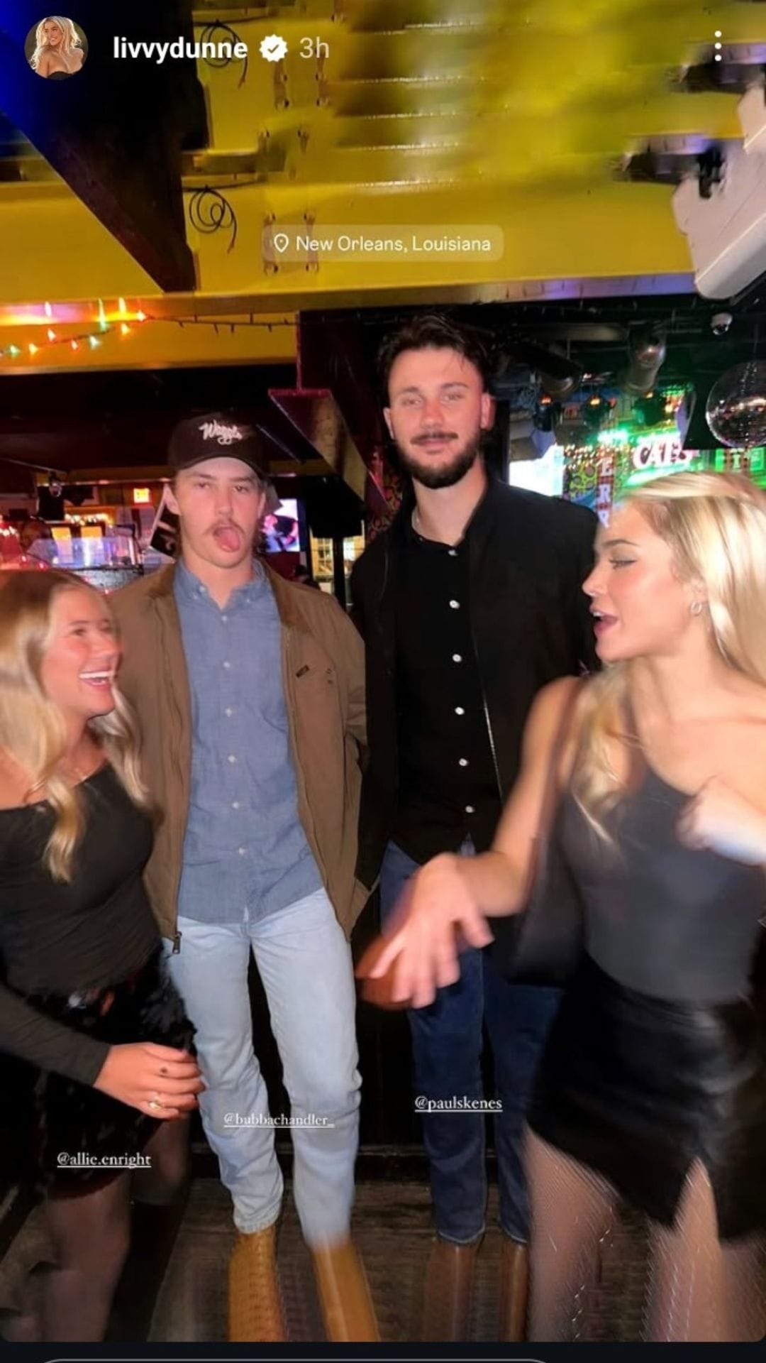 Olivia Dunne turns up the glamour in a black mini skirt as she enjoys ...