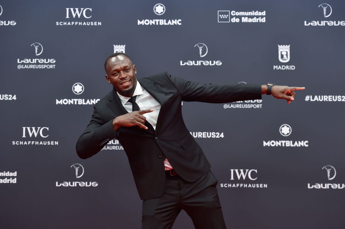 Manchester United fan Usain Bolt makes his feelings known as godson NJJ ...