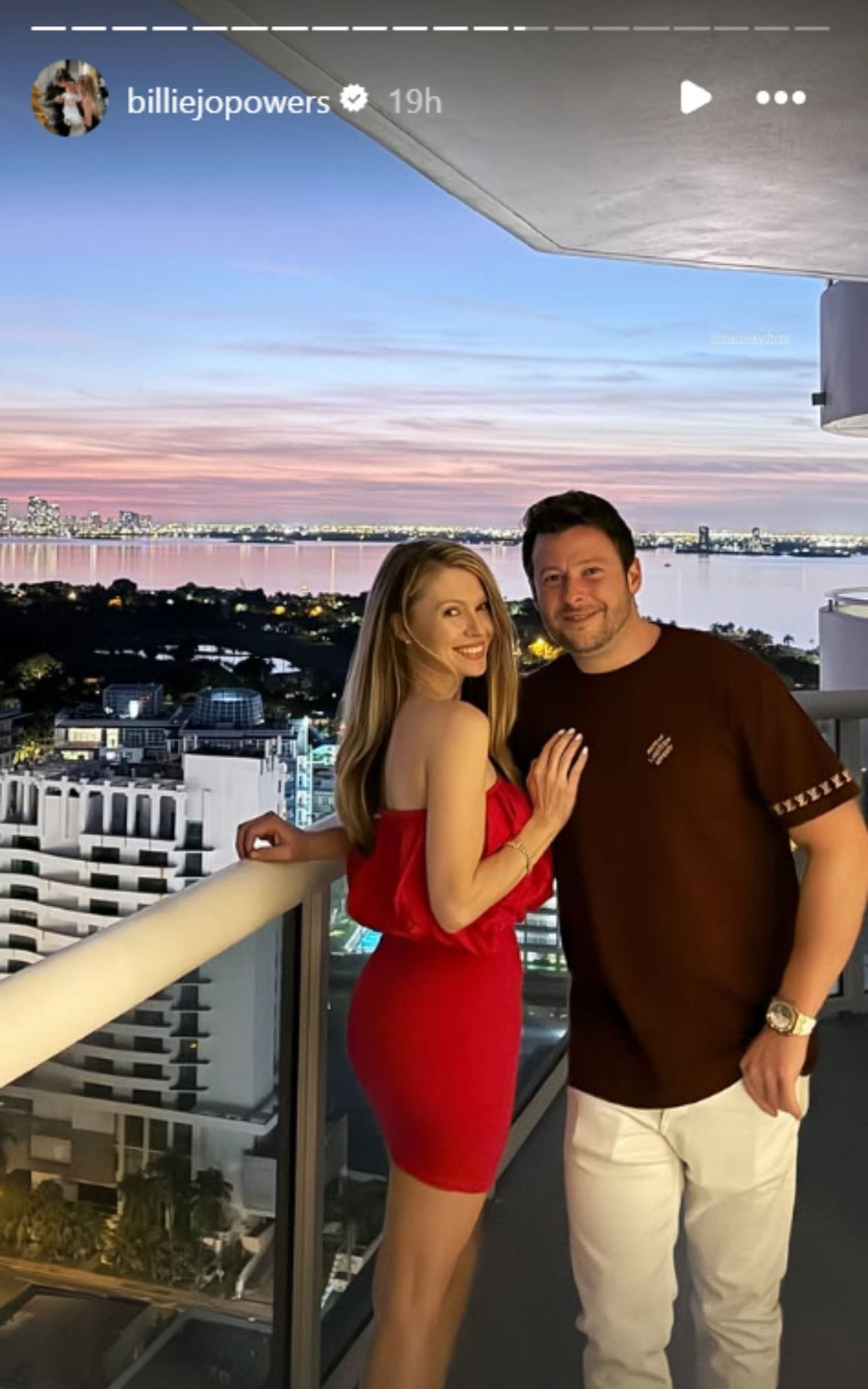 Billie Jo Powers rocks in strapless one-piece as she poses with fiance Marco Andretti in ...