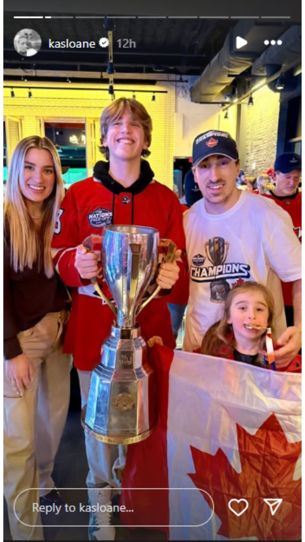 Photo: Brad Marchand celebrates 4 Nations win with stepson Sloane ...
