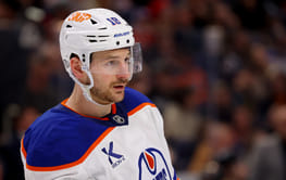 Who are Nathan MacKinnon's parents, Graham and Kathy MacKinnon?