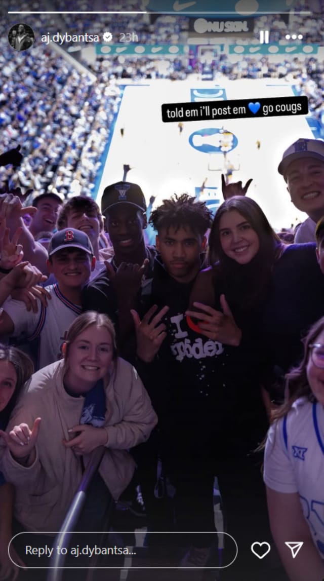 PHOTO: No. 1 prospect AJ Dybantsa shares a moment with BYU fans at Marriott Center