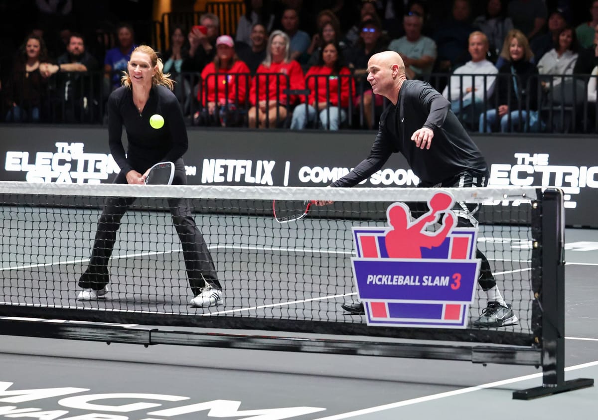 Andre Agassi and wife Steffi Graf all smiles as they pose with American ...
