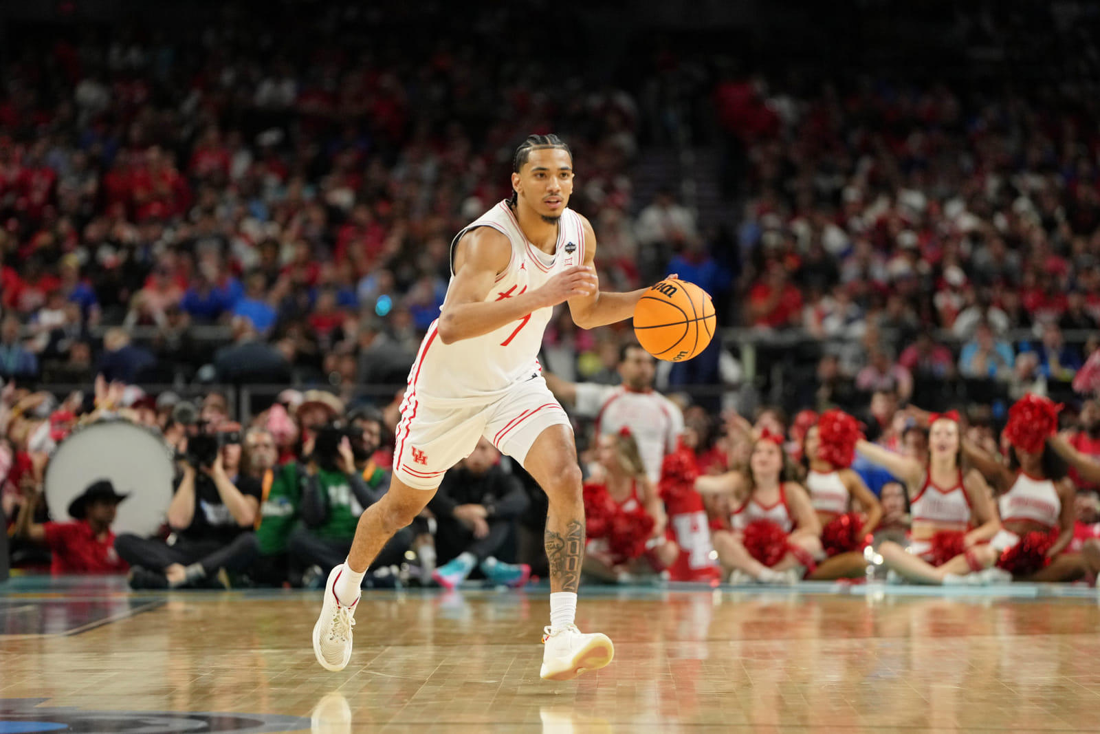 Minutes after Milos Uzan's return, Houston commit Pop Isaacs signs with ...