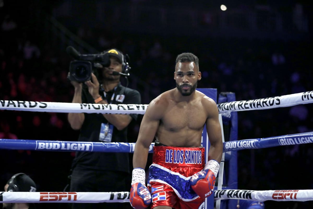 What is Edwin De Los Santos' record?