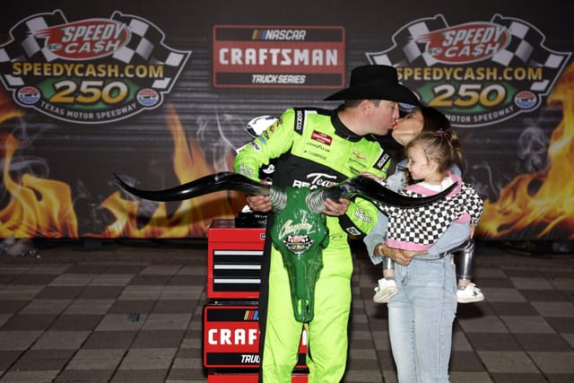 Kyle Busch models for his daughter Lennix as he shows off her makeup skills