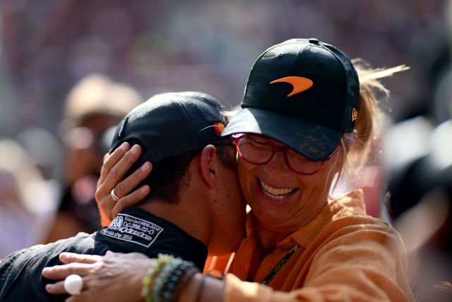Watch: Lando Norris' mother Cisca embraces the McLaren driver after he secures pole position for ...