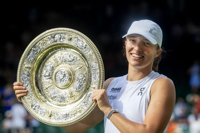 Iga Swiatek hands Amanda Anisimova historic beatdown to win Wimbledon ...