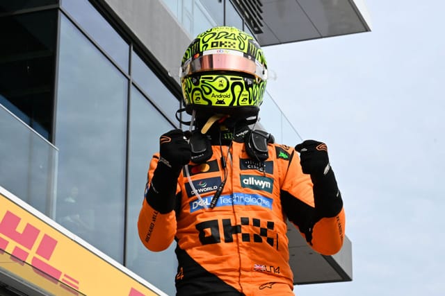 Lando Norris writes a cheeky quote on the champagne after winning the ...
