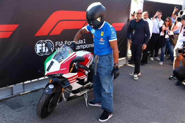 Watch: Lewis Hamilton turns heads in the F1 Italian GP paddock as he ...