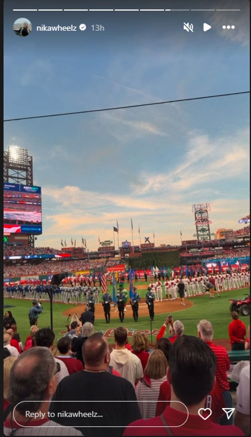 Zack Wheeler's wife Dominique strikes a confident pose in a red Chanel ...