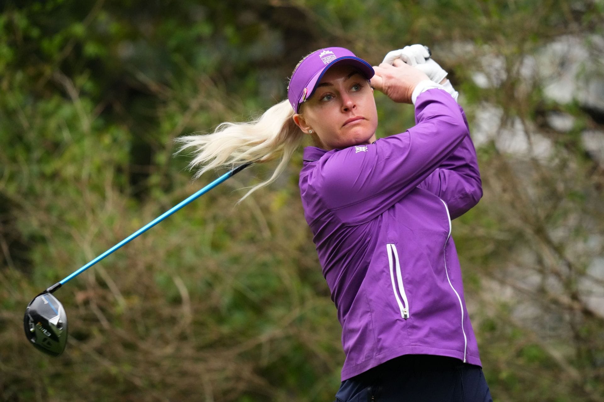 Charley Hull dons white as she practices her swing at Wentworth amid ...