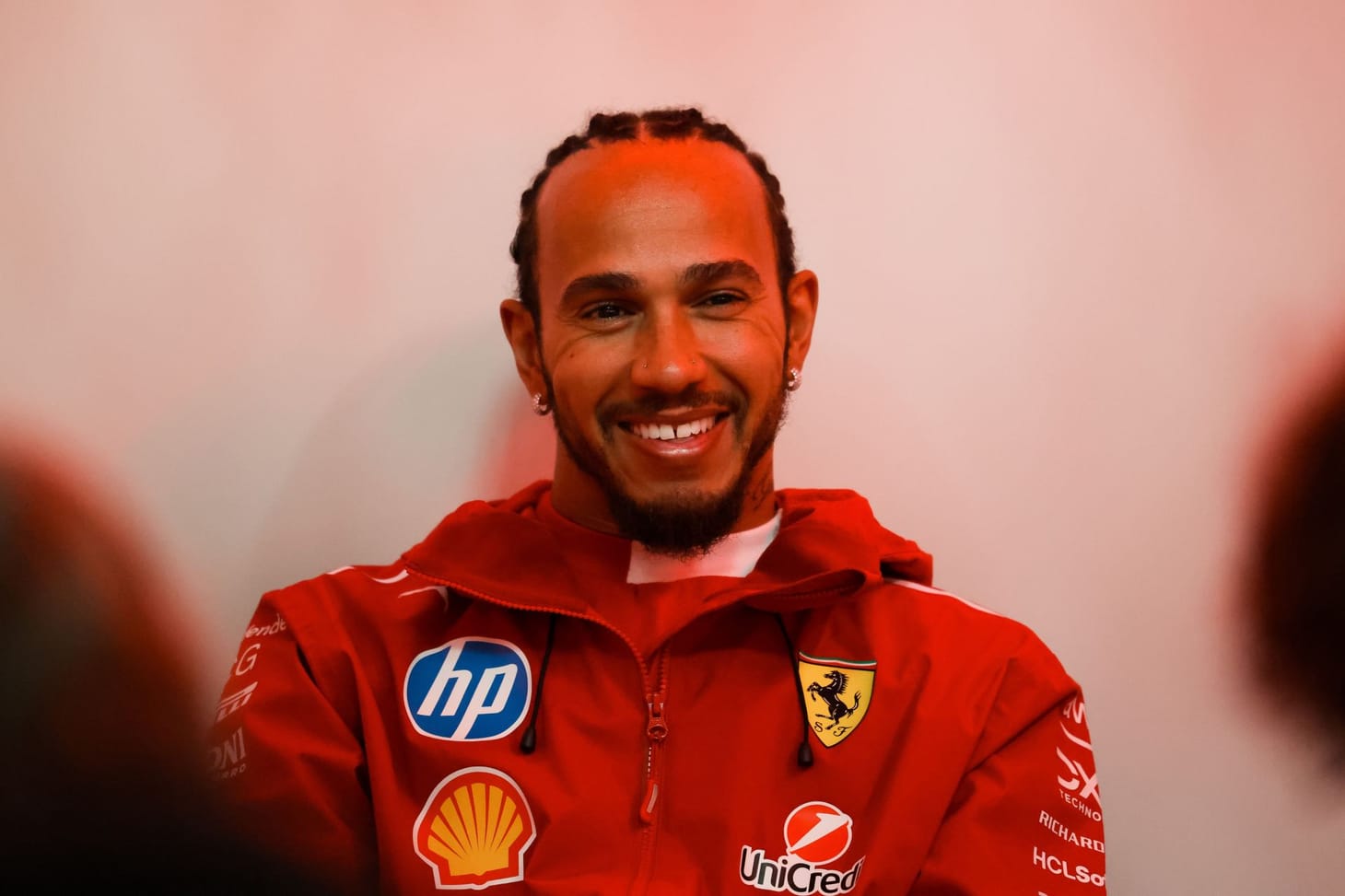 Lewis Hamilton faces fan pushback for his 'driver with a Brazilian flag ...