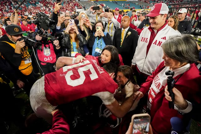 WATCH: Fernando Mendoza celebrates natty win with his wheelchair-bound ...