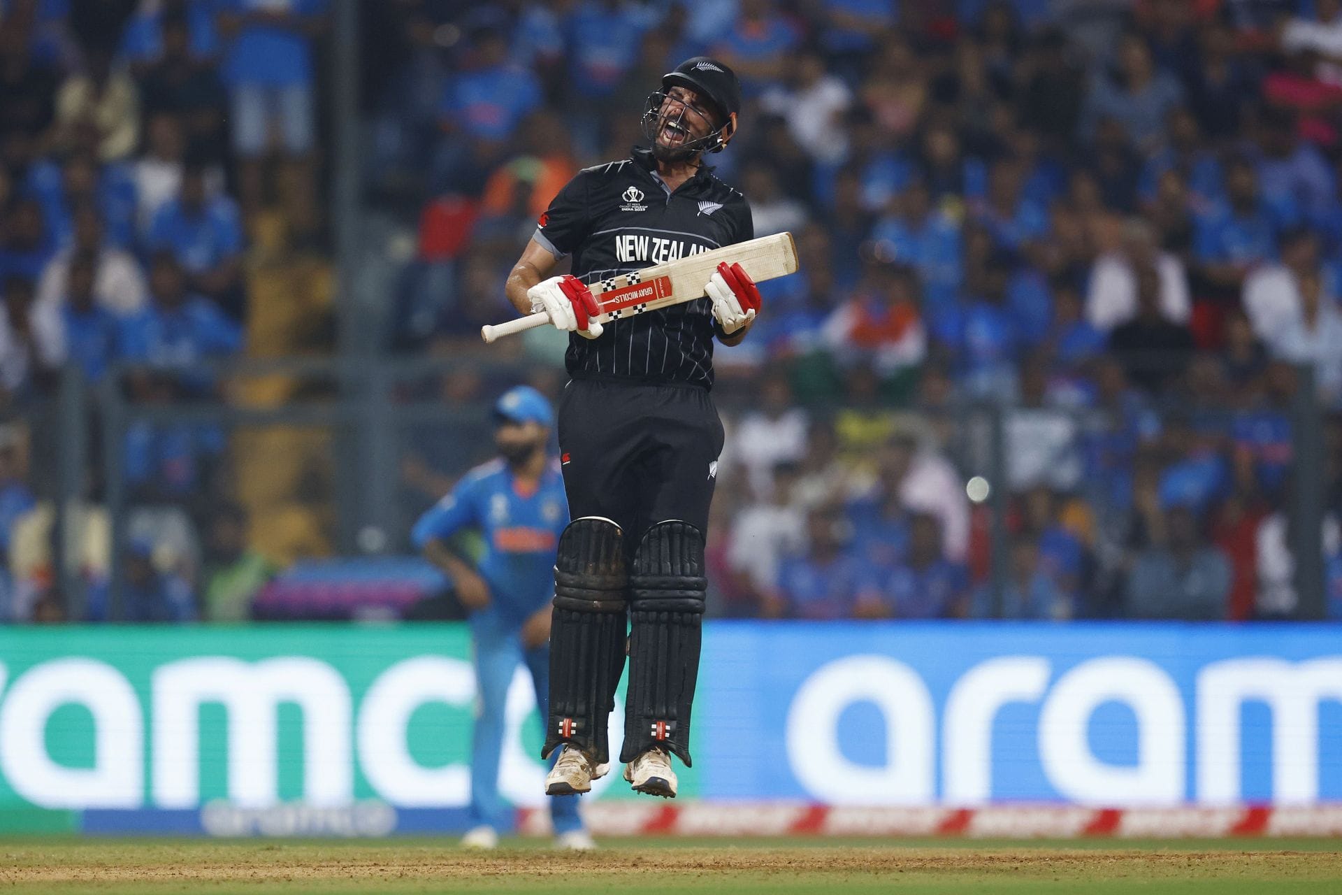 Virat Kohli gifts his signed jersey to Daryl Mitchell in a heartwarming ...