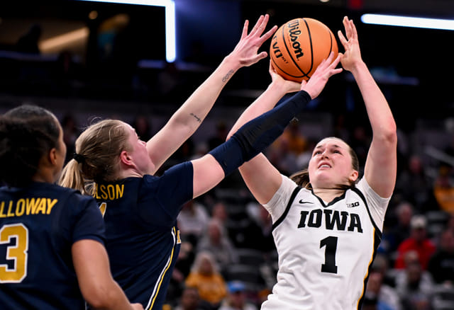 WATCH: Iowa star Taylor Stremlow kicks cameraman in groin during game ...