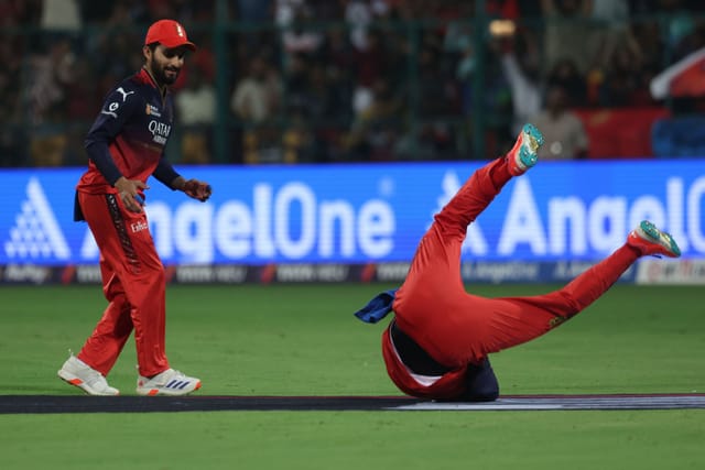 Tim David takes a stunning diving catch to send RCB into their second ...